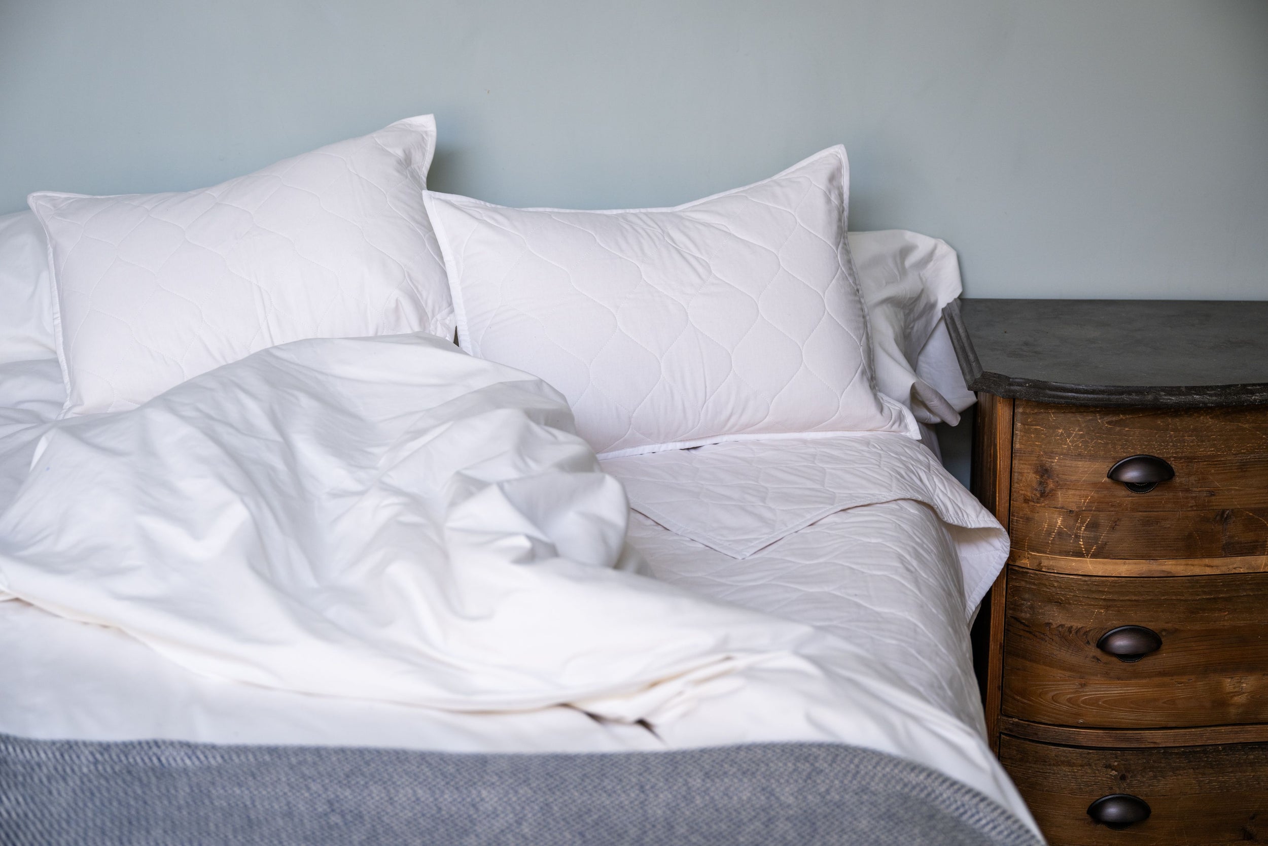 How to layer a bed like a designer: Pro Tips to Follow - American ...